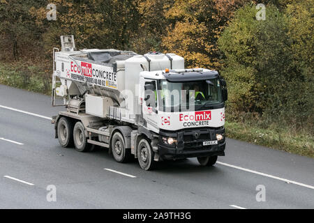 Ready mixed concrete delivery lorry and dumper truck at work on ...