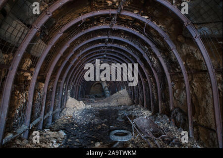 An abandoned mine shaft and rail Stock Photo - Alamy