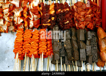 Photo of raw assorted chicken and pork innards sold as street food ...