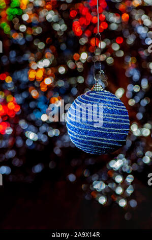 Sparkling Holiday Decorations Hang on a Festive Christmas Tree Adorned ...