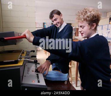 Secondary school 1990s UK. Teenage schoolboys playing basket ball in ...