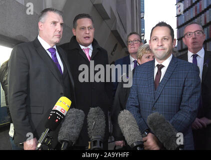 DCI Dave Whellams (left) and DI Perry Benton (centre) speak outside the ...