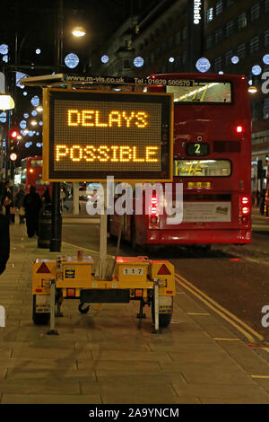 Delays Possible. Traffic delay sign on a mobile solar power electronic ...