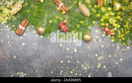 Golden christmas decorations on concrete Stock Photo - Alamy