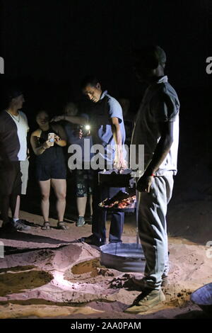 Cooking Zarb Chicken at a Bedouin desert camp, Wadi Rum Protected Area ...