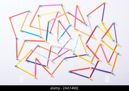 top view of multicolored abstract connected lines with pins, connection ...