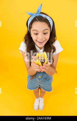 small girl with homemade muffin. healthy food cooking. baking and ...