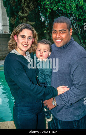 Three African children pose for the camera during the Christmas ...