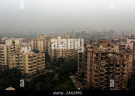 The Delhi smog lies over apartment blocks in Gurgaon Sector 55 reducing ...