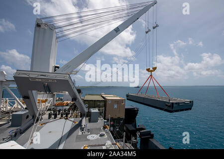 An Improved Navy Lighterage System (INLS) causeway ferry approaches the ...