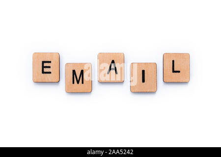 The word EMAIL, spelt with wooden letter tiles over a white background ...