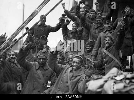 World: c. 1918. Members of the 369th Infantry Regiment band under the ...