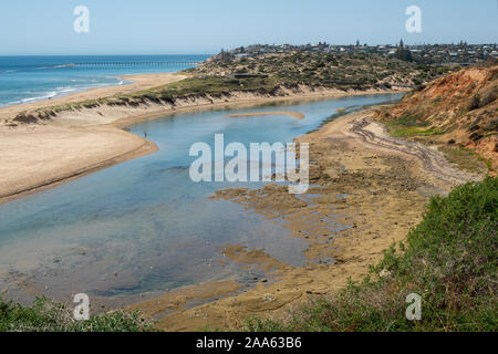 Onkaparinga River on a sunny day with reflections of trees and cliffs ...