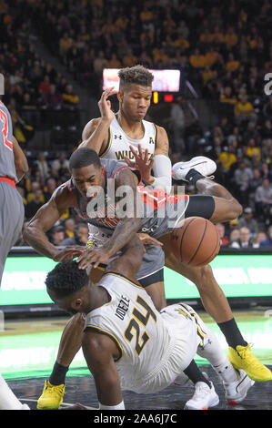 Kansas State guard Nate Johnson (34) and Nebraska guard Sam Hoiberg (1 ...