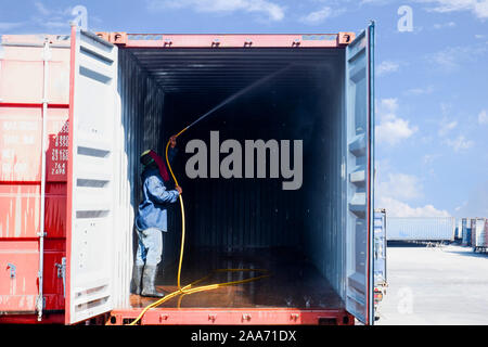 Cleaning inside containers Industry for export and import Stock Photo ...