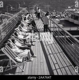 Sunbathing in the '60s Stock Photo - Alamy