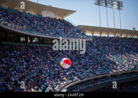Beach ball floating above the crowd at a stadium event Stock Photo - Alamy