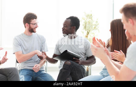 young people greet each other to the applause of their friends Stock ...
