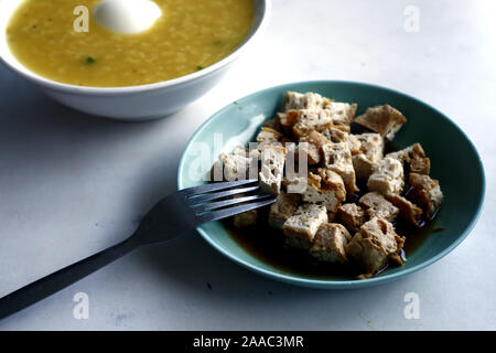 Photo of freshly cooked sliced fried tokwa or tofu served as side dish ...