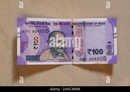 New Indian currency of 100 rupee note on white isolated background ...