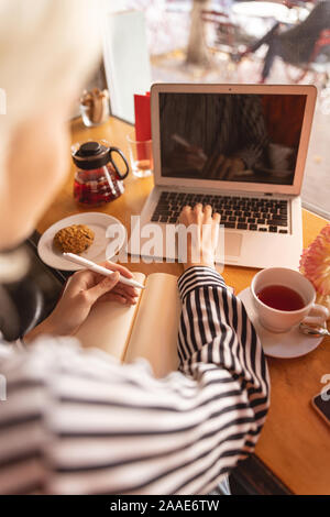The young writer working on his new work Stock Photo - Alamy