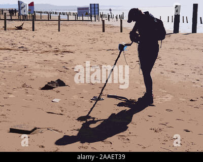Woman, metal detecting on a Brean beach Somerset UK, silhouette, cutout ...