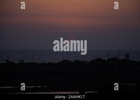 the sunset in different perspective and beauty of it in the colors of ...