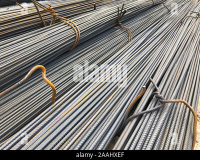 Concrete reinforcement: stack of steel rebar cut and bent Stock Photo ...