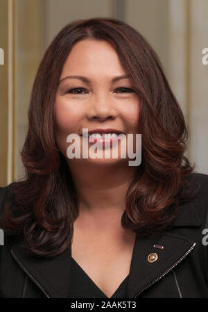 U.S. Senator Tammy Duckworth (D-IL) with a family member near the ...