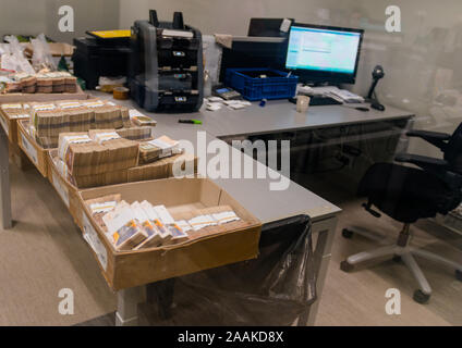 Vast amount of cash divided and sorted with currency bands and placed ...