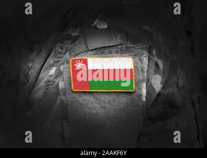 Flag of Oman on military uniform. Army, armed forces, soldiers. Collage ...