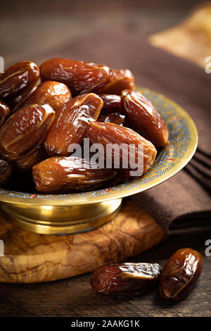 Dates. Dried date palm fruits. Healthy sweet snack food bowl. Pile of ...
