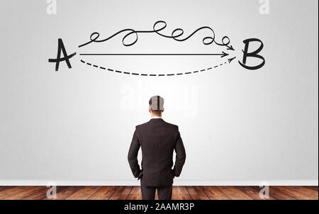 Businessman looking for connection between two things while standing in ...