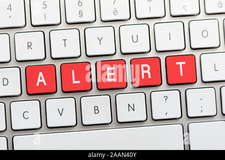 ALARM writing on white keyboard Stock Photo - Alamy