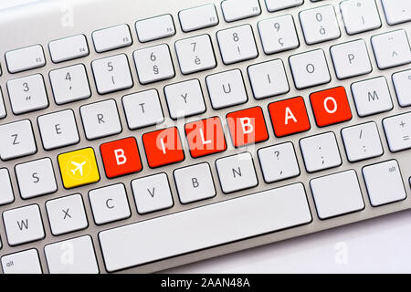 BILBAO writing on white keyboard with a aircraft sketch Stock Photo - Alamy
