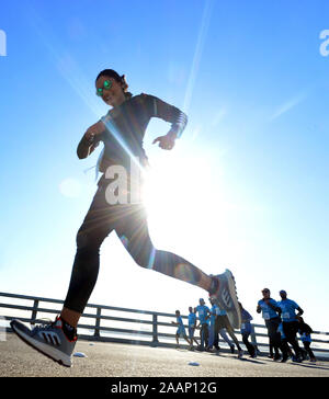 Kuwait City, Kuwait. 23rd Nov, 2019. Runners participate in a charity ...