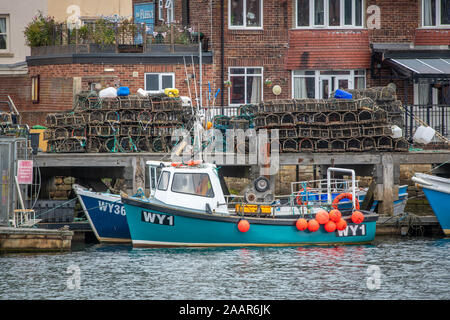 Fishing craft docked in Whitby, United Kingdom Stock Photo - Alamy
