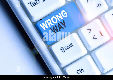 Conceptual hand writing showing Wrong Way. Concept meaning taking an ...