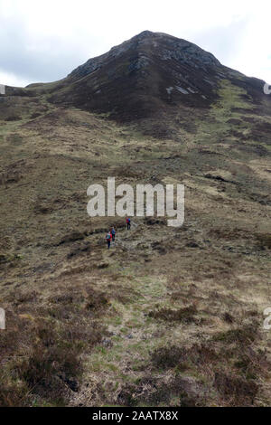 Three Men Walking on Stob Coire Sgoilte from the Scottish Mountain ...
