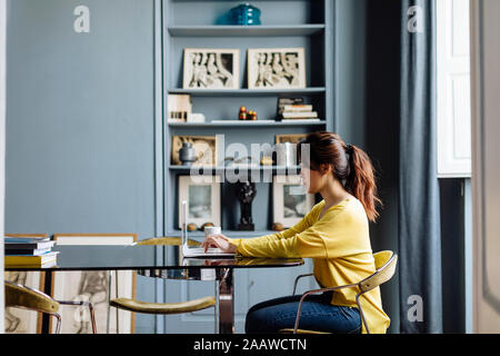 Asian woman professional using laptop computer for remote work sitting ...