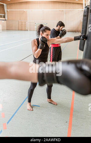 Female boxers practising in sports hall Stock Photo - Alamy