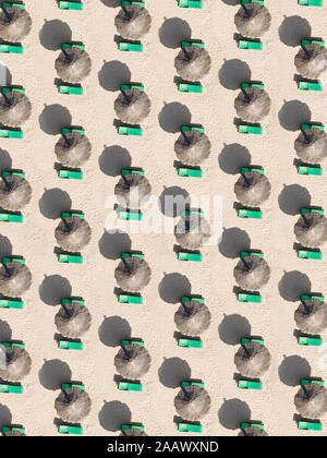 Part of the straw beach umbrellas and View of the beautiful blue sky ...