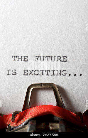 The sentence, The Future is Exciting..., written with a typewriter ...