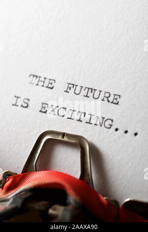 The sentence, The Future is Exciting..., written with a typewriter ...