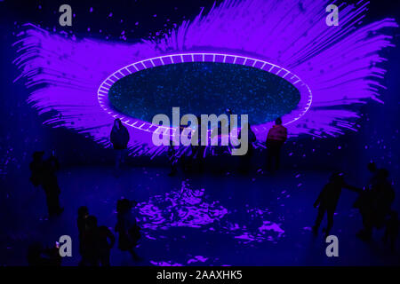 Big aquarium with jellyfish or meduses in the neon light in new opened ...