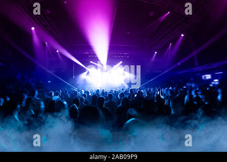 Concert crowd attending a huge gig Stock Photo - Alamy