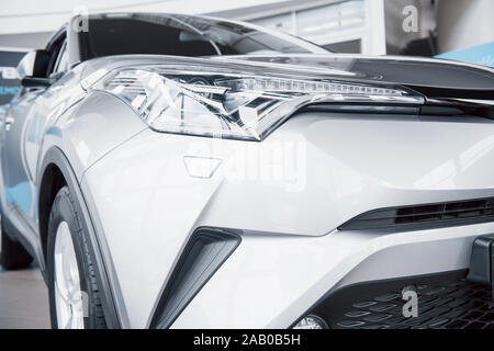 front headlamp with brilliant reflections of the body of the car Stock ...