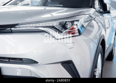 front headlamp with brilliant reflections of the body of the car Stock ...