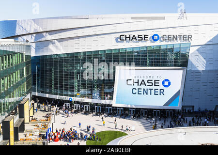 Exterior of Chase Center arena with signage, security barriers, and ...