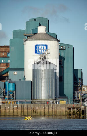 the tate and lyle sugar plant at silvertown on the river thames in ...